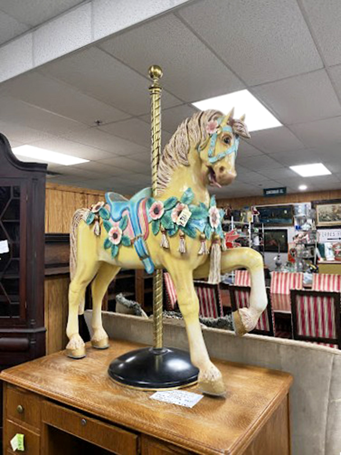 This carnival carousel horse prances eternally on its wooden stand, its pastel decorations a frozen moment from childhood summers past.