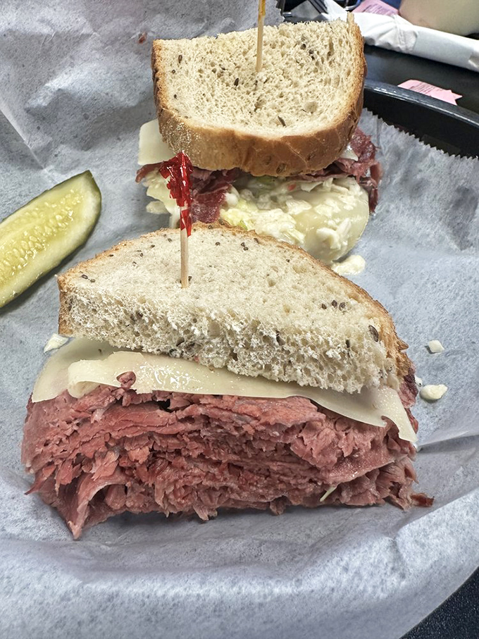 The Reuben: where corned beef, sauerkraut, Swiss, and Russian dressing hold their annual summit meeting on rye bread, and world peace seems possible.