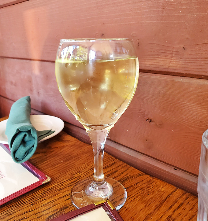 A glass of crisp Riesling waiting patiently to complement your meal &ndash; like finding the perfect dance partner who knows all your moves.