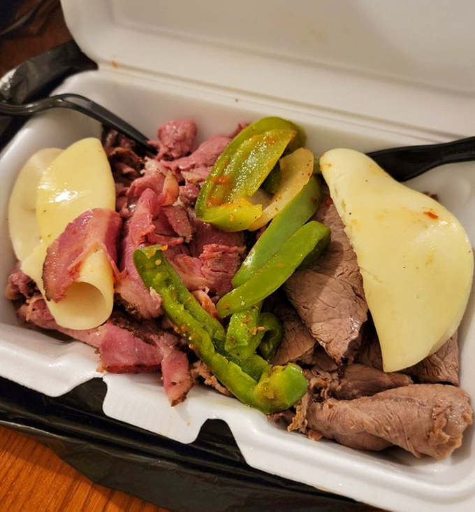 A protein paradise of roast beef, pastrami, cheese, and peppers. This isn't just a plate&mdash;it's a declaration that vegetables are merely supporting actors.