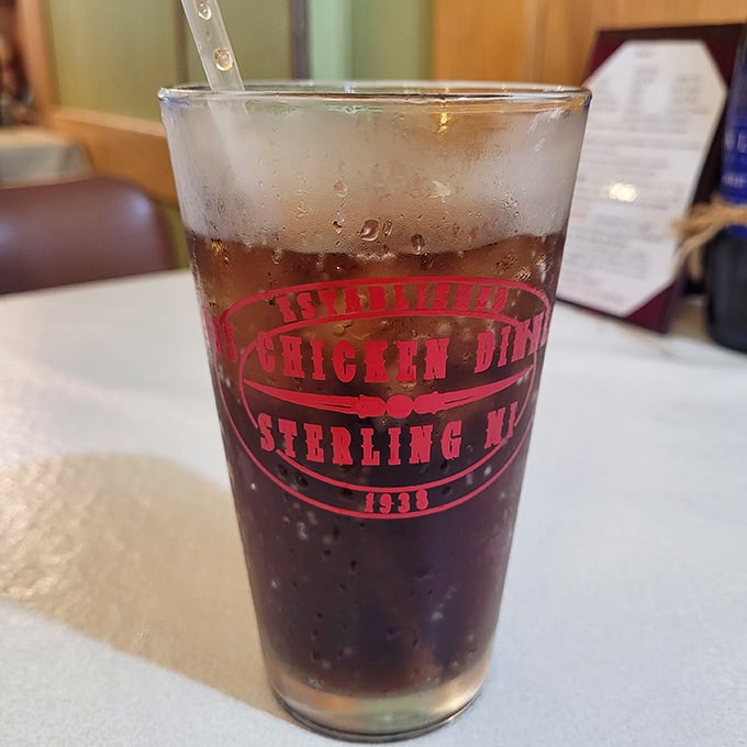 Not just any root beer&mdash;a frosty mug of nostalgia with the restaurant's logo proudly displayed. Sip slowly and contemplate the meaning of carbonated bliss.