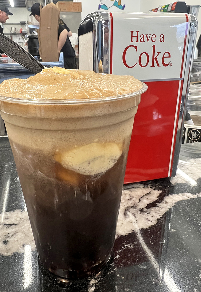 The classic Coke float&mdash;where soda and ice cream perform their timeless dance of fizzy, creamy perfection.