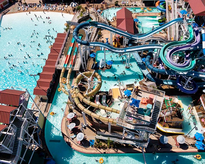 Sunsplash Water Park: where adults rediscover their inner child and outer sunburn while navigating slides designed by someone who clearly enjoyed physics class.