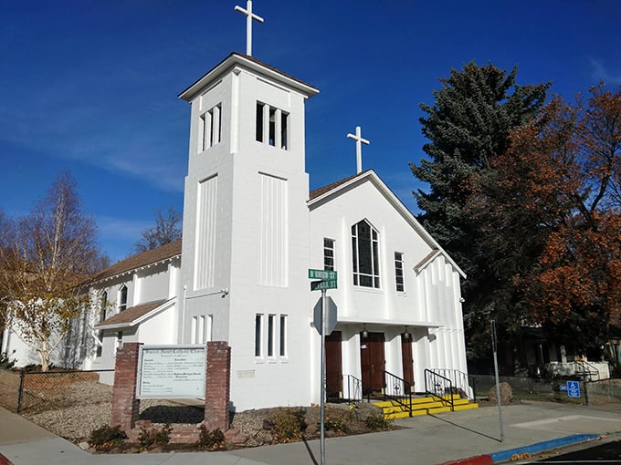Sacred Heart Catholic Church stands as a spiritual landmark, its white facade gleaming against Susanville's brilliant blue skies.