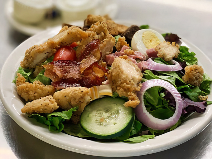 A salad that doesn't apologize for including fried chicken and bacon. "Health food" with Midwestern common sense.