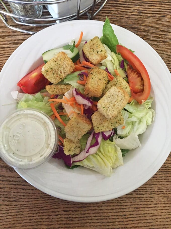 A garden-fresh salad with house-made croutons&mdash;because sometimes you need something green before diving back into burger territory.