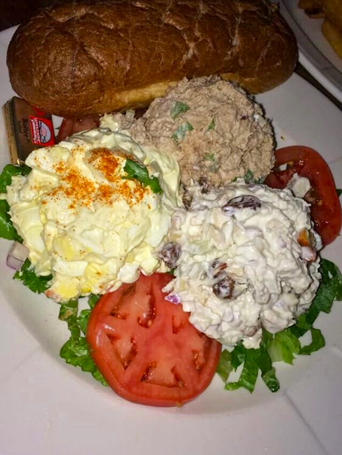 A trio of fresh salads proves Irish food isn't all potatoes and meat – though that hearty roll suggests they haven't abandoned tradition entirely.