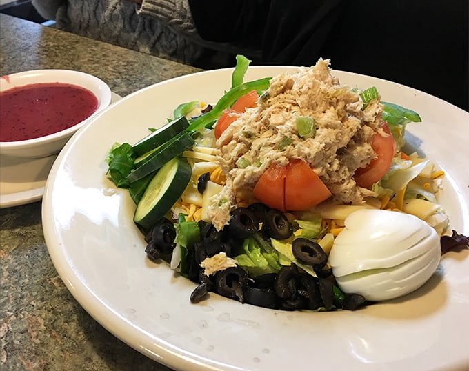 Even their salads mean business, loaded with fresh vegetables, hard-boiled egg, and enough tuna to make you forget you ordered the "light option."