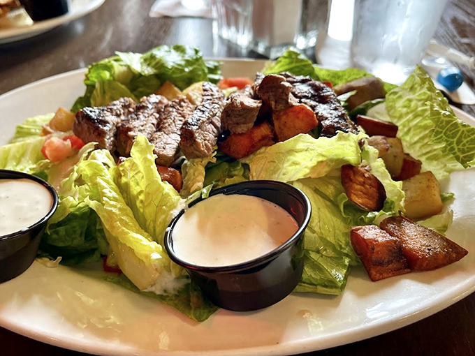 A salad that's actually exciting? With grilled steak, fresh greens, and house-made dressings, this one breaks all the boring salad rules.