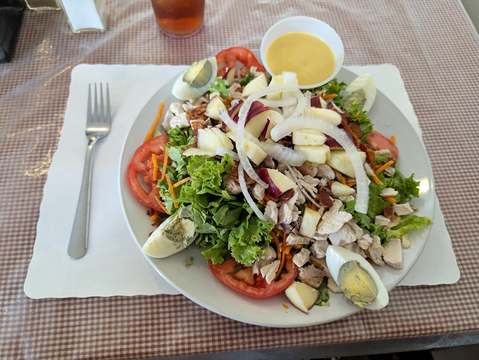 A salad this fresh and abundant almost makes you forget you came for the scrapple fries. Almost.