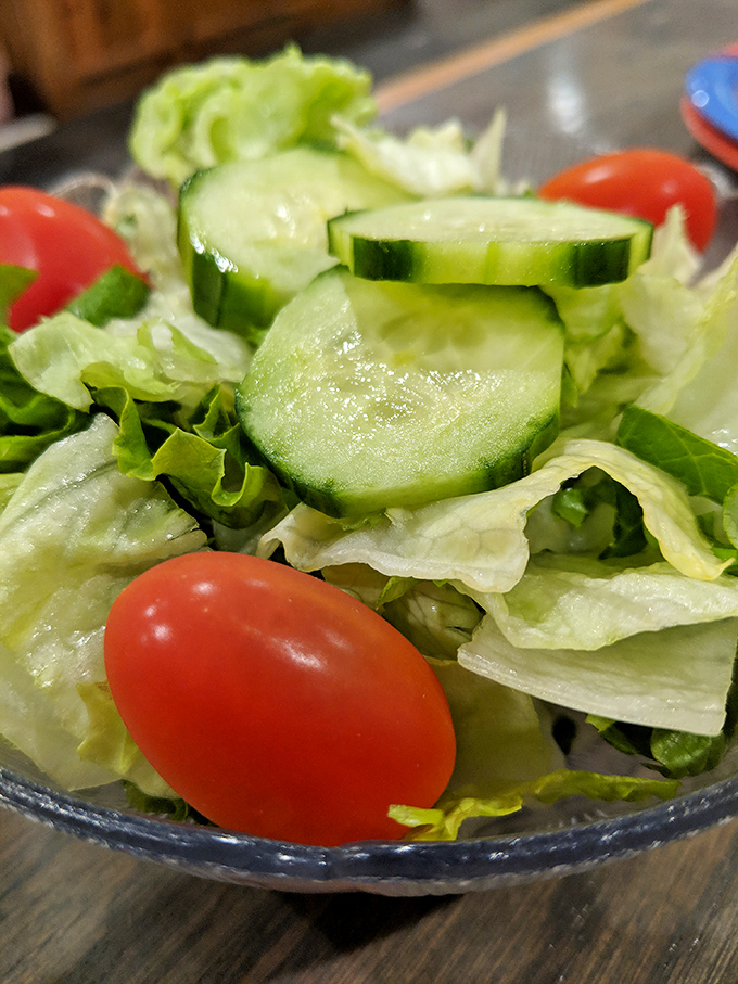 Even the house salad shows care&mdash;crisp vegetables offering a refreshing counterpoint to the parade of fried delights to come.