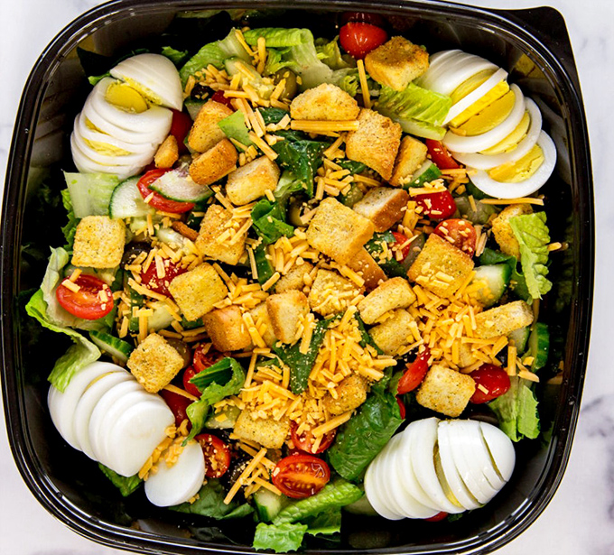 A salad at a deli is like bringing a library book to a rock concert&mdash;technically allowed, but missing the point entirely. Still looks fresh, though!