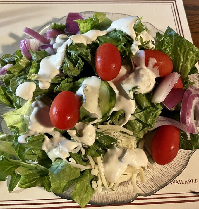 Even the salad gets the respect it deserves at Henry's. Fresh, crisp, and generous&mdash;the opening act that sets the stage for seafood stardom.