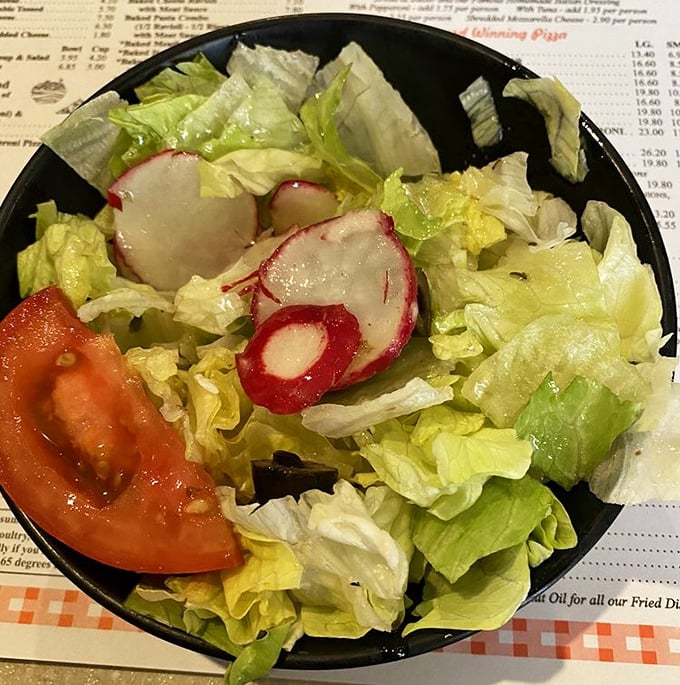 Even the salad gets special treatment at Luigi's, with crisp lettuce, fresh veggies, and that house dressing that somehow makes vegetables taste like a treat.