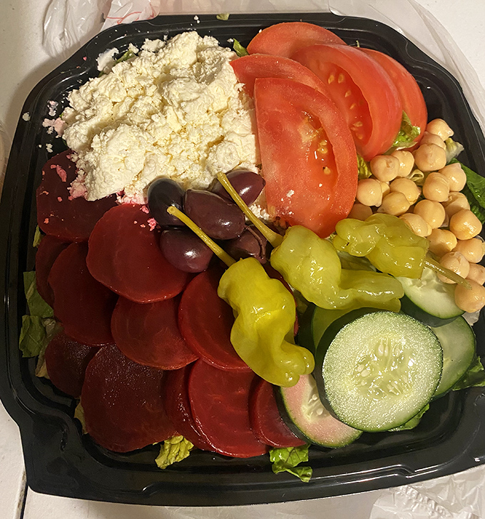Even the salads at a barbecue joint deserve respect. This colorful arrangement proves vegetables can hold their own in a meat-centric universe.