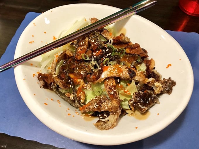 This isn't just a salad &ndash; it's a textural adventure where crispy salmon skin meets fresh vegetables in a harmonious flavor marriage.