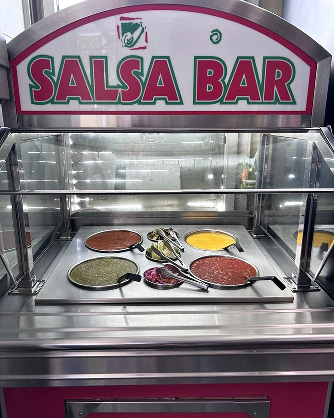 The salsa bar at El Rincón isn't just condiments—it's a color wheel of possibilities, each spoonful capable of taking your meal in a new direction.