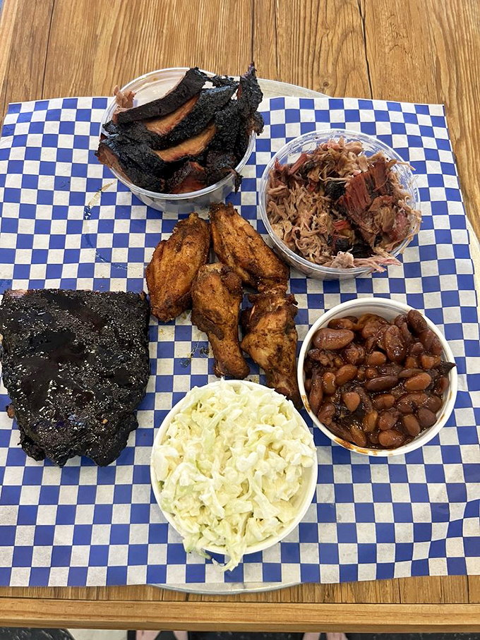 The barbecue sampler plate: where decision-making anxiety transforms into the joy of having it all. Those beans mean business.