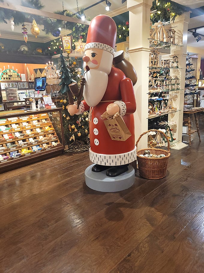 The shop's towering nutcracker sentinel stands ready with his sack of goodies, like Santa's more intimidating German counterpart.