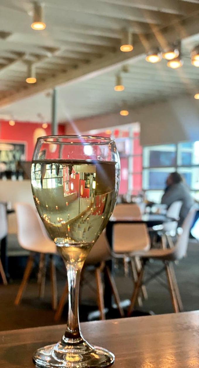 Even their wine glasses catch the light perfectly. A quiet moment of civilization amid Austin's cheerful chaos. 