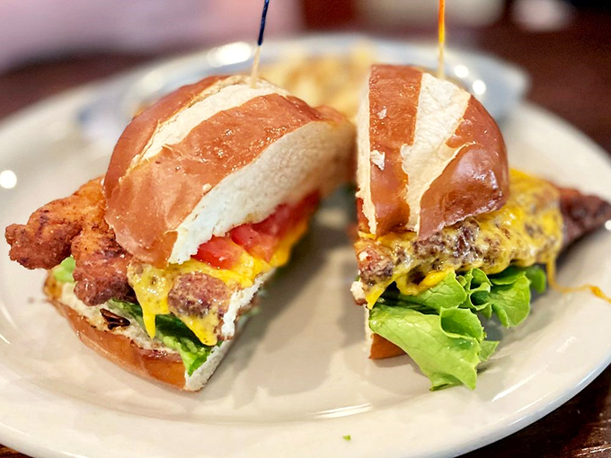 The schnitzel sandwich – where crispy, golden pork and pretzel bun unite in holy matrimony, with lettuce, tomato and cheese as delighted witnesses.