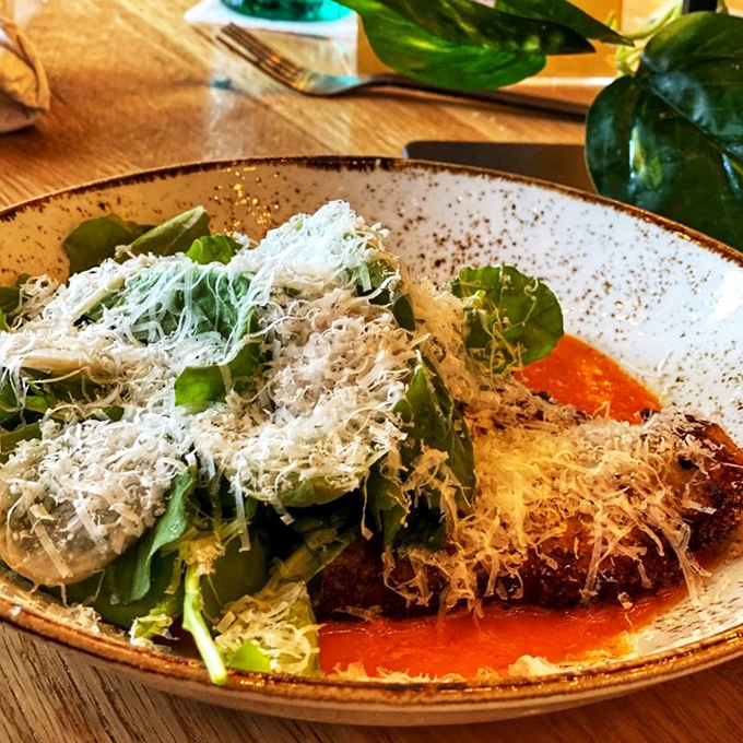 A dish that demands to be photographed before devoured. The melding of textures and colors creates a plate that's as much art as it is appetite-satisfying sustenance.