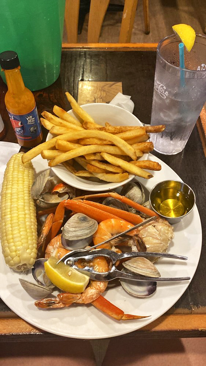 The seafood feast that launches a thousand napkins. Corn on the cob, crab legs, clams, and shrimp&mdash;a delicious puzzle waiting to be solved.
