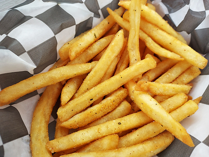 Golden, crispy, and seasoned with what must be some sort of addictive potato magic. French fries elevated to art form status.