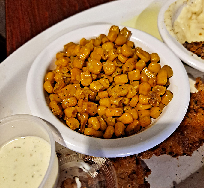 Sweet corn kernels glistening with butter and seasonings&mdash;proof that even the simplest sides get star treatment at Lowake.