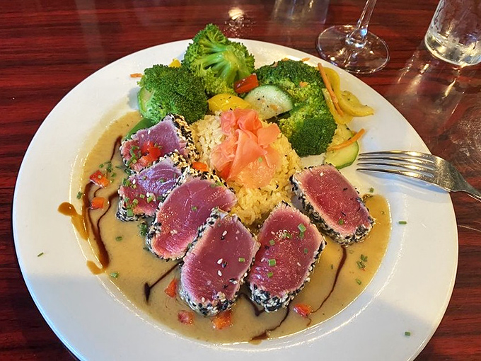 Sesame-crusted tuna that's perfectly seared on the outside, ruby-red within, surrounded by a colorful landscape of vegetables and rice&mdash;edible art that tastes even better than it looks.