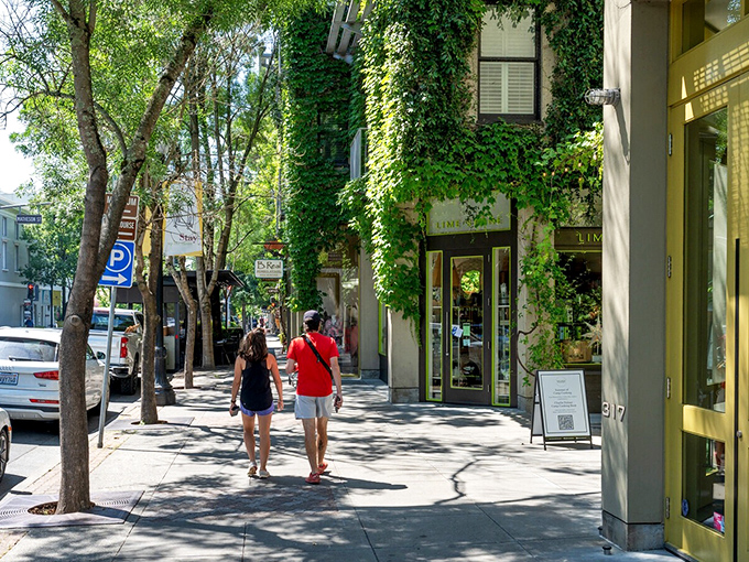 Tree-shaded sidewalks invite leisurely strolls between boutiques, where "just browsing" becomes "just bought everything" faster than you can say "credit limit."