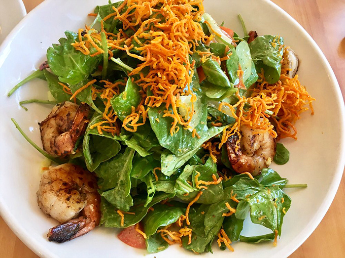 Fresh greens topped with plump shrimp prove that even diners can deliver restaurant-quality salads with style.
