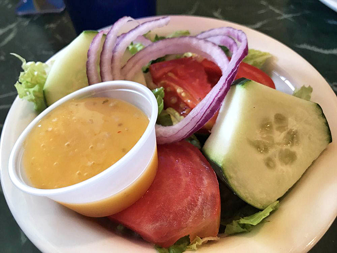 A garden-fresh salad that proves vegetables can be more than just an obligation&mdash;they can be a delight, especially with that sunshine-yellow dressing.