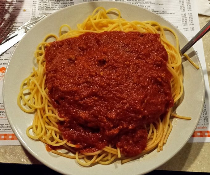 Spaghetti that would make your Italian grandmother weep with joy. The sauce-to-pasta ratio achieves what mathematicians call "the golden mean of deliciousness."