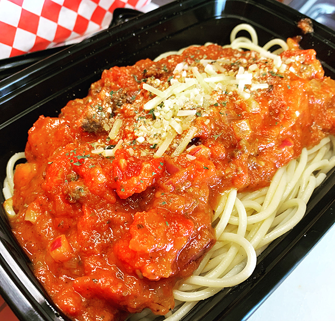 Spaghetti that doesn't apologize for being exactly what you want. That sauce looks like it's been simmering since breakfast.