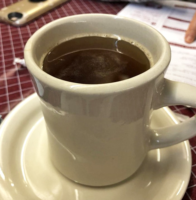 The humble diner mug&mdash;vessel of liquid ambition and endless refills. This coffee isn't pretentious, but it gets the job done beautifully.