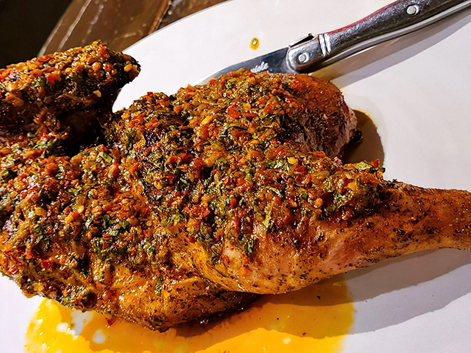 A pork chop that's been introduced to herbs, spices, and fire with such skill that it might ruin all future pork chops for you.