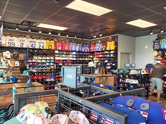 Sports jerseys and caps creating a rainbow of team loyalty at discount prices.