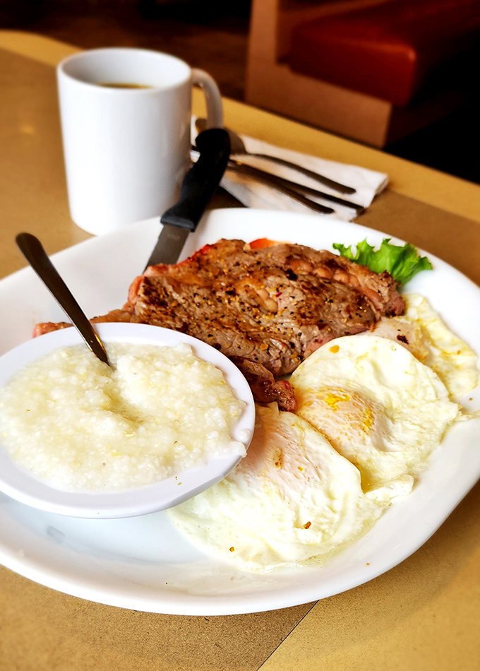 The breakfast power move: steak and eggs with grits on the side. The kind of meal that makes you want to build something afterward.