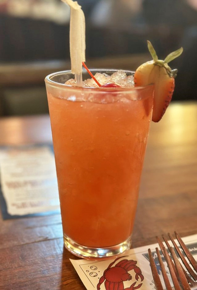 A strawberry crush that's part cocktail, part dessert, and entirely responsible for making waiting for your steak a pleasure rather than a chore.