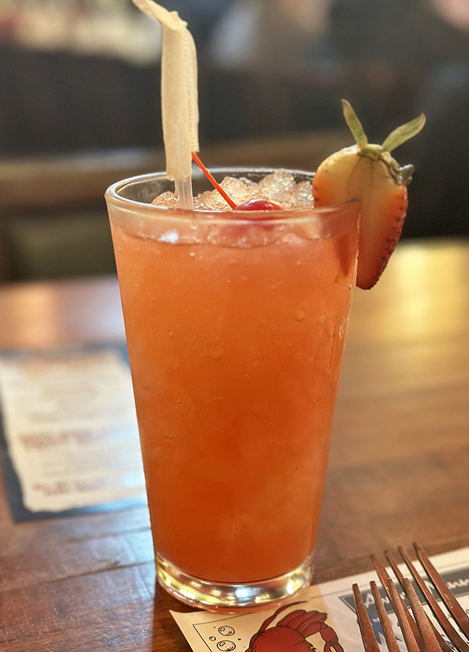 This isn't just a strawberry lemonade &ndash; it's summer in a glass, complete with a fruit garnish that's trying to steal the show.