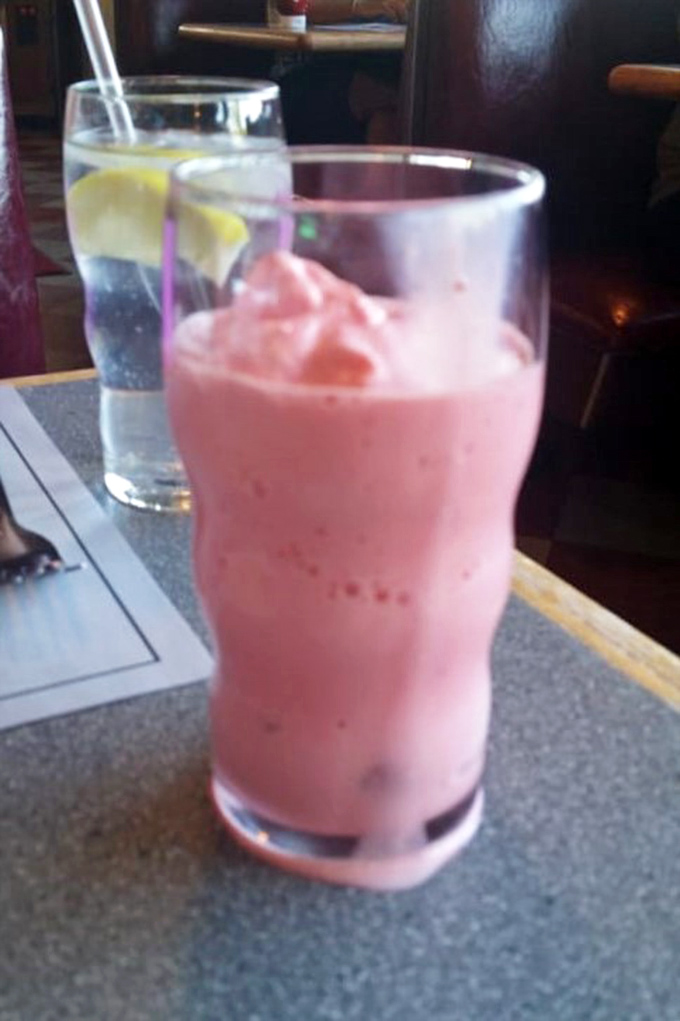 That strawberry milkshake isn't just pink&mdash;it's a commitment to happiness. Thick enough for a spoon, but worth the straw struggle.