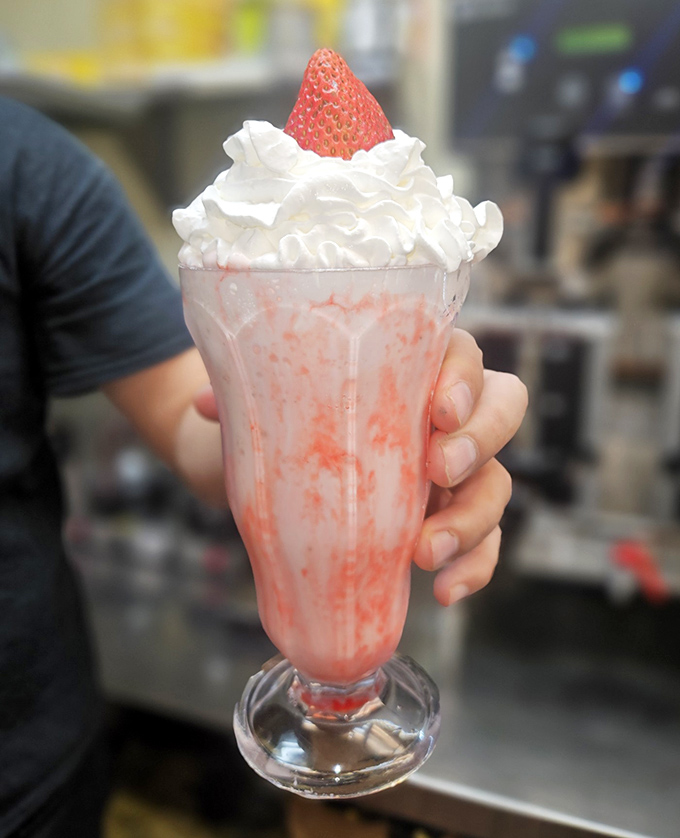 This strawberry milkshake isn't just a drink&mdash;it's a dessert, a work of art, and a childhood memory all swirled into one glorious glass.