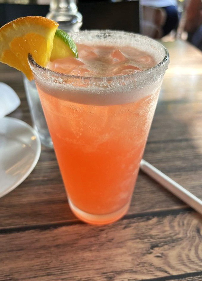 This peachy-pink cocktail isn't just a drink, it's a vacation in a glass&mdash;complete with a sugar rim "beach" and citrus "sunshine."