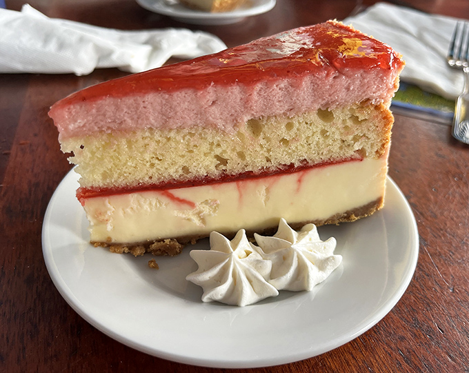 This isn't just dessert&mdash;it's therapy with a fork. Strawberry shortcake meets cheesecake in a romance sweeter than any Hallmark movie you've ever watched. 