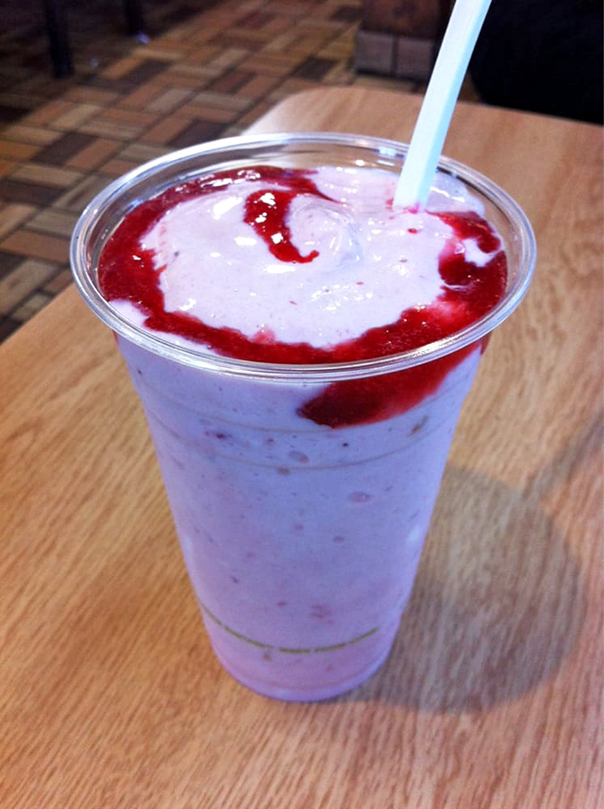 Strawberry swirls dance through creamy vanilla like a dessert ballet. This milkshake brings all the flavor-seekers to the yard, no doubt.