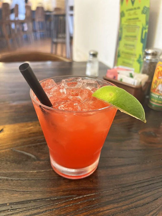 The strawberry margarita&mdash;where fruit meets tequila in a vacation-worthy glass. That lime wedge isn't just garnish; it's an exclamation point.