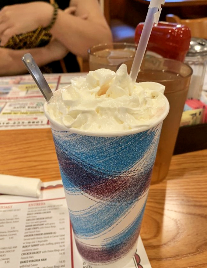 Not just a milkshake, but a work of drinkable art. That whipped cream crown deserves its own royal title.