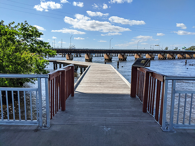 This wooden boardwalk invites contemplation, offering front-row seats to the daily water ballet of boats, birds, and occasional manatees.