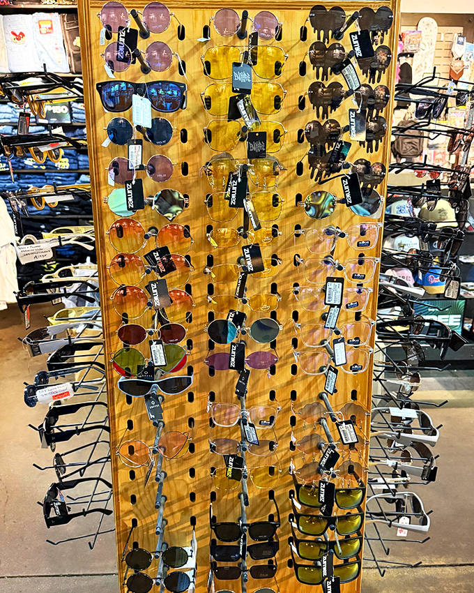 Sunglasses display that rivals a Vegas buffet&mdash;overwhelming choices where you'll try on twelve pairs before finding your perfect match.